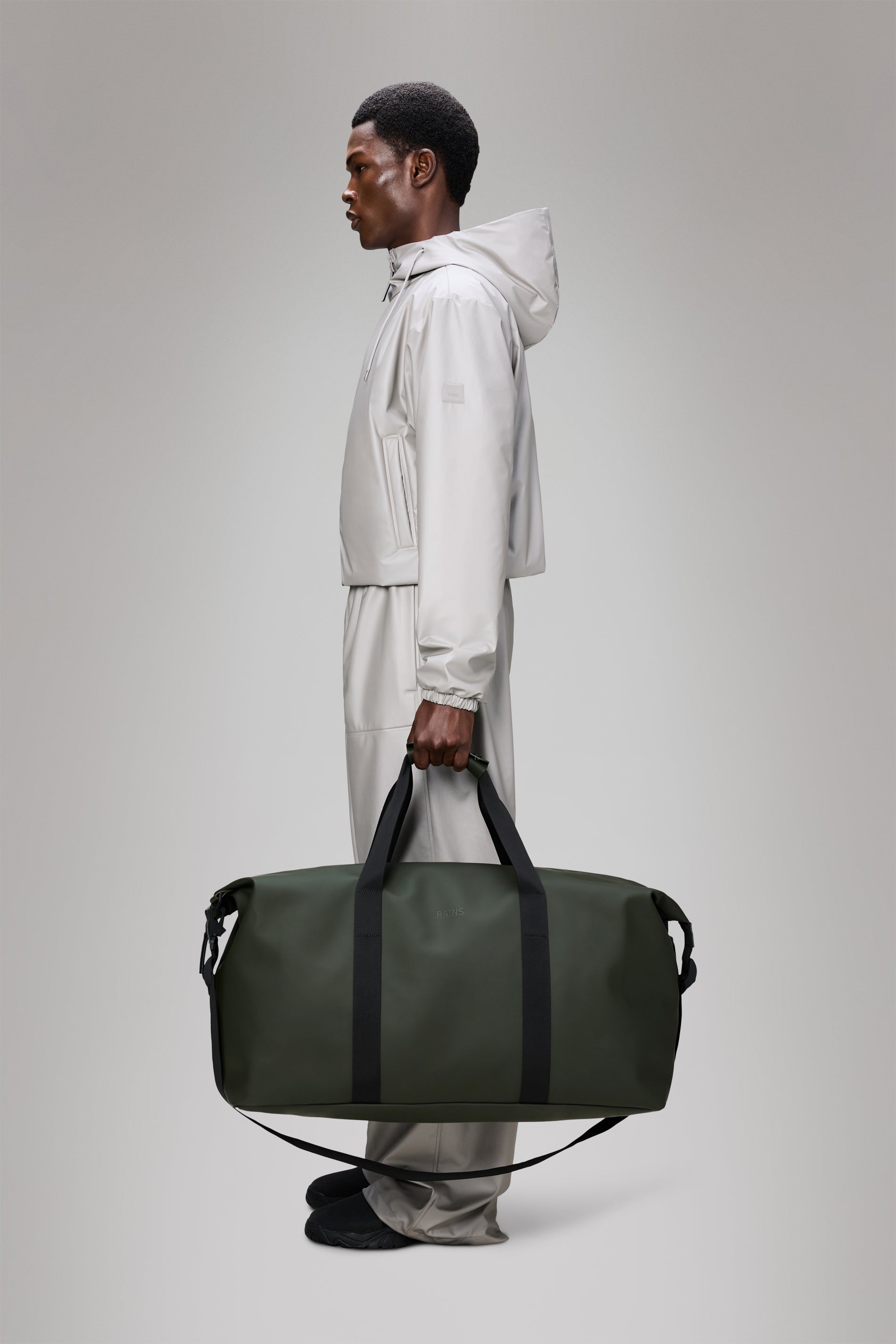 Rains® Hilo Weekend Bag Small in Black for £69 | No Custom Duty