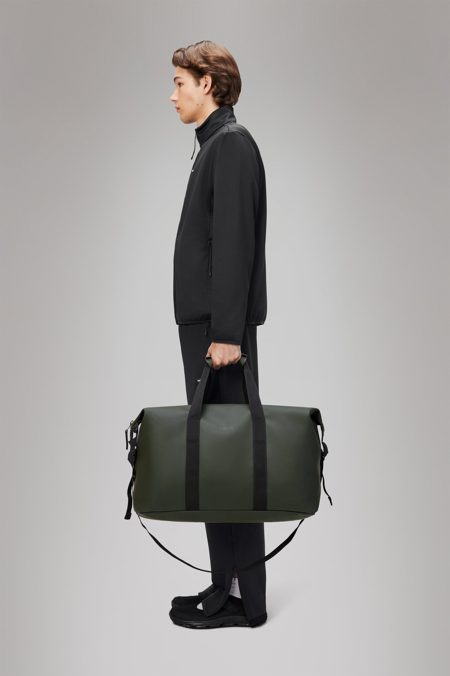 Rains® Hilo Weekend Bag in Black for £79 | No Custom Duty
