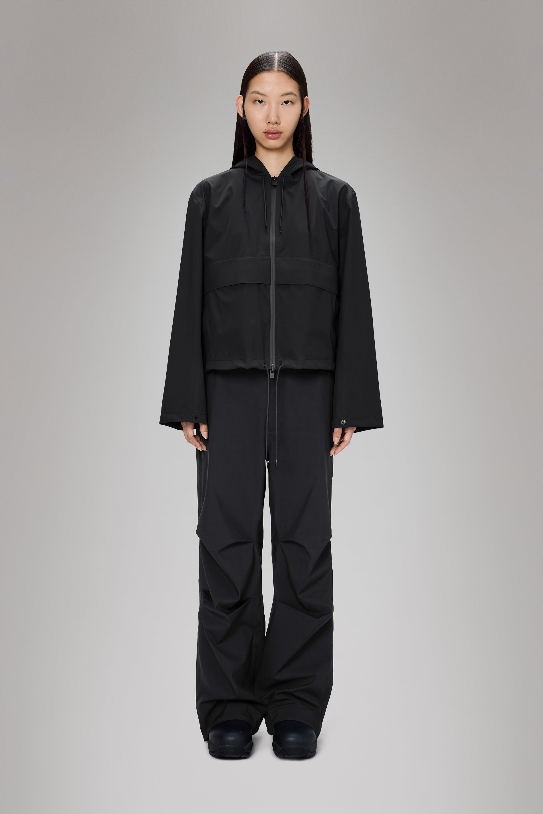 Rains® Suva Hardshell Short String W Jacket in Black for £219 | Free ...