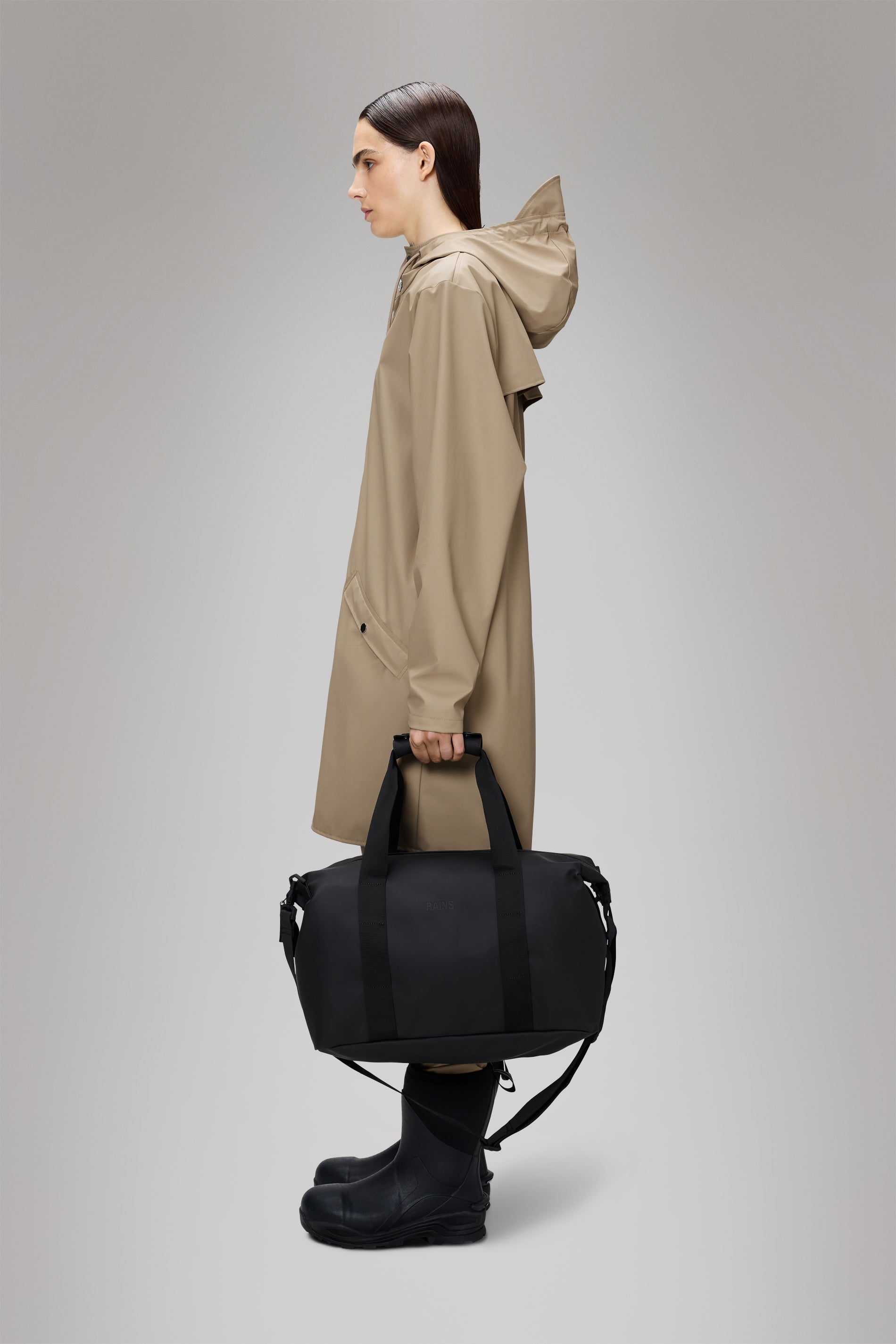 Rains® Hilo Weekend Bag Small in Black for £69 | No Custom Duty