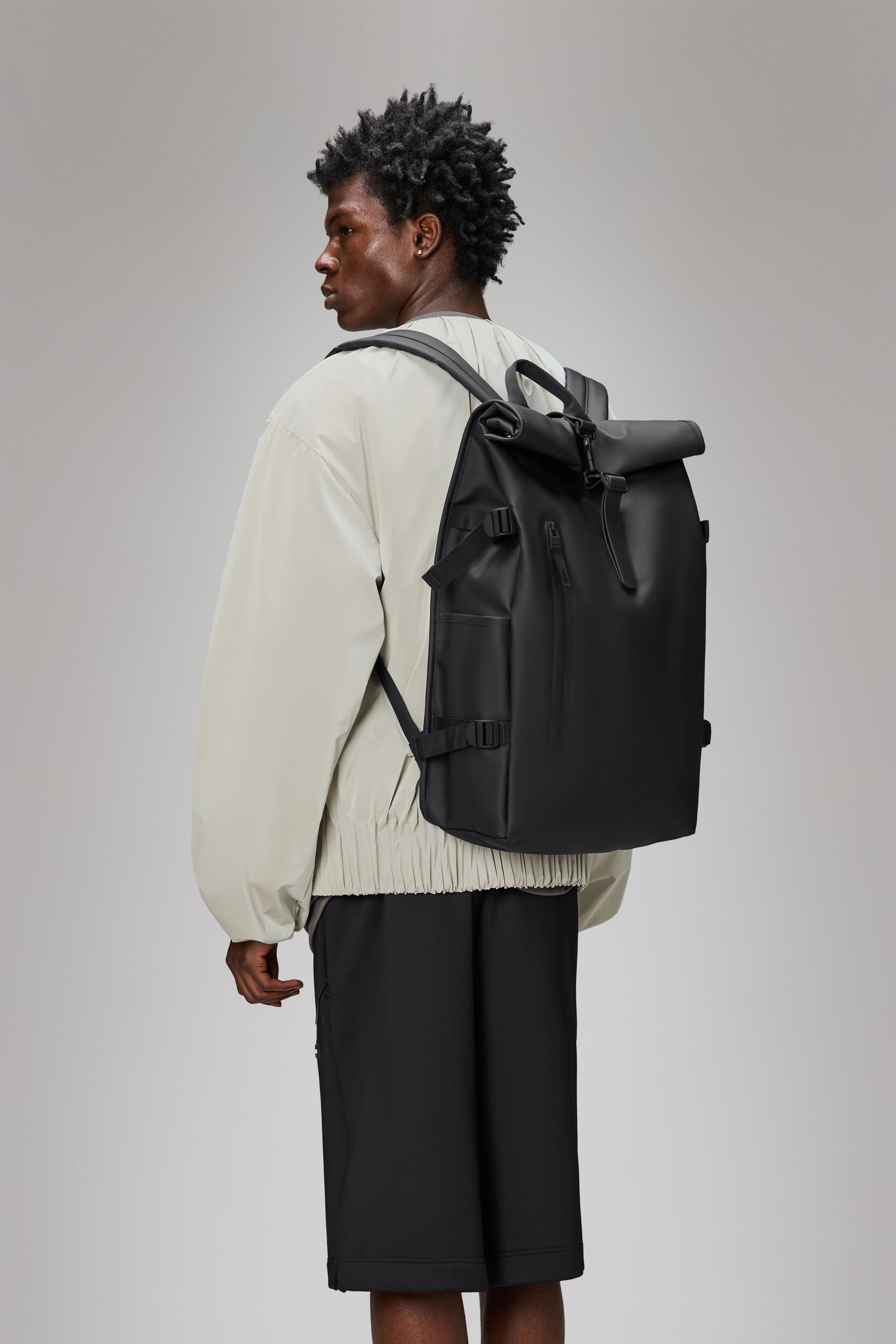 Rains® Rolltop Rucksack Large in Black for £135 | Free Shipping
